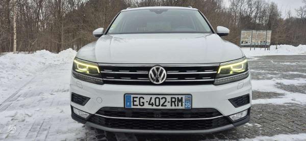 White Volkswagen Tiguan 2016 in Taurage, with an engine capacity of 1.97 L and mileage of 300 thousand km for 13800 €, photo 4 on AUTOMOTO.COM.LV