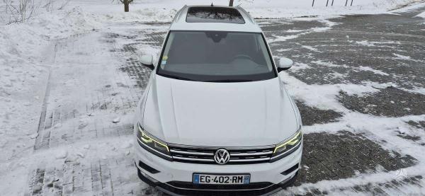 White Volkswagen Tiguan 2016 in Taurage, with an engine capacity of 1.97 L and mileage of 300 thousand km for 13800 €, photo 6 on AUTOMOTO.COM.LV