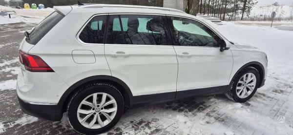 White Volkswagen Tiguan 2016 in Taurage, with an engine capacity of 1.97 L and mileage of 300 thousand km for 13800 €, photo 10 on AUTOMOTO.COM.LV