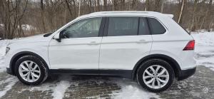 White Volkswagen Tiguan 2016 in Taurage, with an engine capacity of 1.97 L and mileage of 300 thousand km for 13800 €, photo 11 on AUTOMOTO.COM.LV