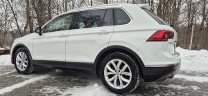 White Volkswagen Tiguan 2016 in Taurage, with an engine capacity of 1.97 L and mileage of 300 thousand km for 13800 €, photo 12 on AUTOMOTO.COM.LV