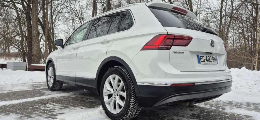 White Volkswagen Tiguan 2016 in Taurage, with an engine capacity of 1.97 L and mileage of 300 thousand km for 13800 €, photo 13 on AUTOMOTO.COM.LV