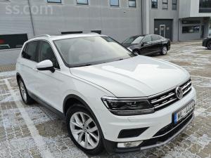 White Volkswagen Tiguan 2016 in Riga, with an engine capacity of 2.00 L and mileage of 279 thousand km for 14699 €, photo  on AUTOMOTO.COM.LV