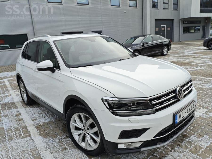 White Volkswagen Tiguan 2016 in Riga, with an engine capacity of 2.00 L and mileage of 279 thousand km for 14699 €, photo 1 on AUTOMOTO.COM.LV