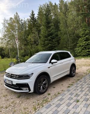 White Volkswagen Tiguan 2016 in Riga, with an engine capacity of 2.00 L and mileage of 206 thousand km for 17800 €, photo  on AUTOMOTO.COM.LV