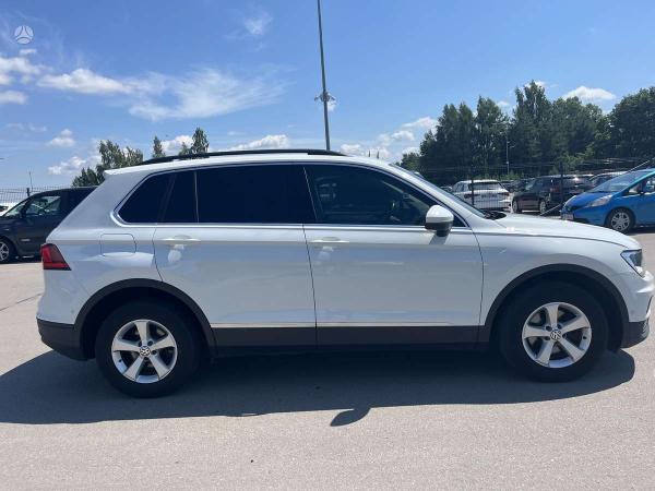 White Volkswagen Tiguan 2016 in Taurage, with an engine capacity of 1.97 L and mileage of 230 thousand km for 11500 €, photo 5 on AUTOMOTO.COM.LV