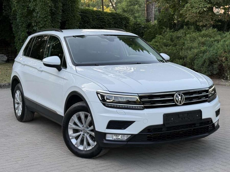 White Volkswagen Tiguan 2016 in Prienai, with an engine capacity of 1.97 L and mileage of 165 thousand km for 14950 €, photo 1 on AUTOMOTO.COM.LV