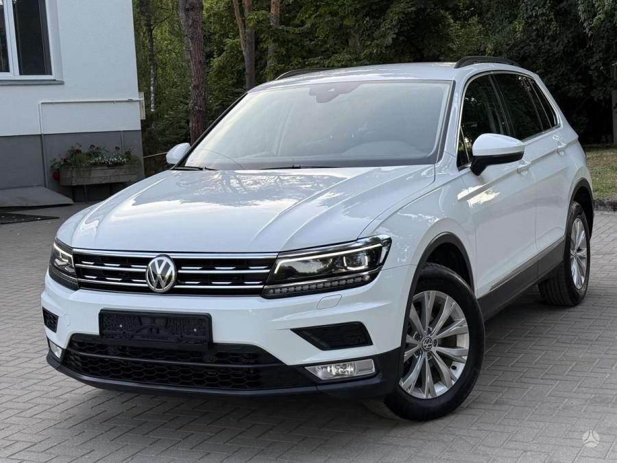 White Volkswagen Tiguan 2016 in Prienai, with an engine capacity of 1.97 L and mileage of 165 thousand km for 14950 €, photo 3 on AUTOMOTO.COM.LV