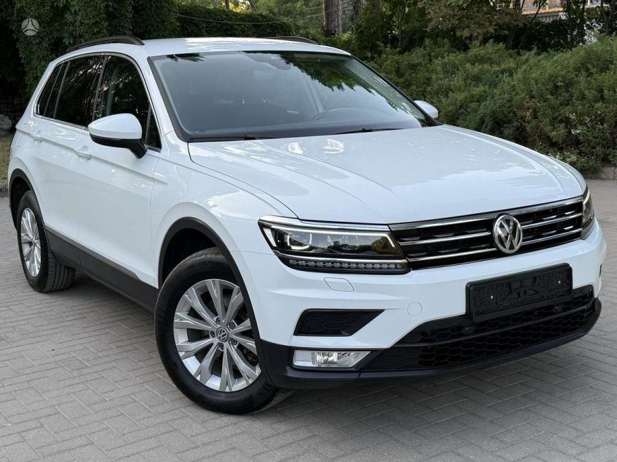 White Volkswagen Tiguan 2016 in Prienai, with an engine capacity of 1.97 L and mileage of 165 thousand km for 14950 €, photo 4 on AUTOMOTO.COM.LV