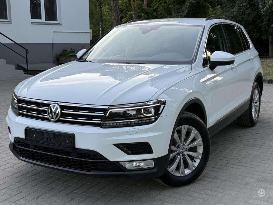 White Volkswagen Tiguan 2016 in Prienai, with an engine capacity of 1.97 L and mileage of 165 thousand km for 14950 €, photo 5 on AUTOMOTO.COM.LV