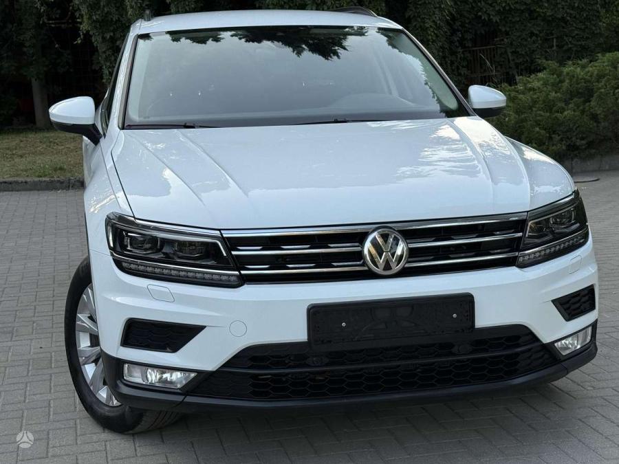 White Volkswagen Tiguan 2016 in Prienai, with an engine capacity of 1.97 L and mileage of 165 thousand km for 14950 €, photo 11 on AUTOMOTO.COM.LV