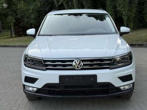 White Volkswagen Tiguan 2016 in Prienai, with an engine capacity of 1.97 L and mileage of 165 thousand km for 14950 €, photo 12 on AUTOMOTO.COM.LV