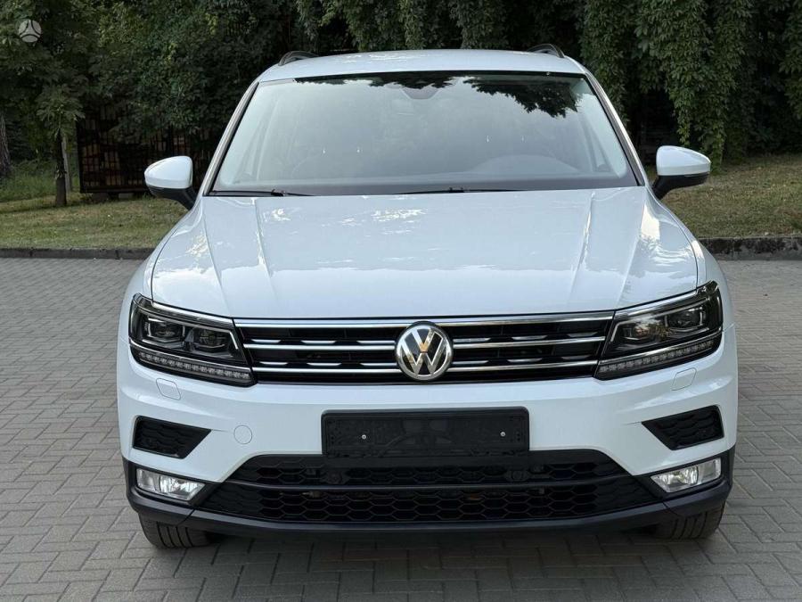 White Volkswagen Tiguan 2016 in Prienai, with an engine capacity of 1.97 L and mileage of 165 thousand km for 14950 €, photo 12 on AUTOMOTO.COM.LV