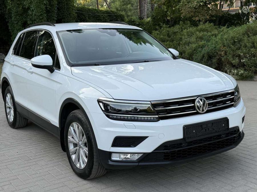 White Volkswagen Tiguan 2016 in Prienai, with an engine capacity of 1.97 L and mileage of 165 thousand km for 14950 €, photo 13 on AUTOMOTO.COM.LV