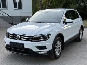 White Volkswagen Tiguan 2016 in Prienai, with an engine capacity of 1.97 L and mileage of 165 thousand km for 14950 €, photo 14 on AUTOMOTO.COM.LV