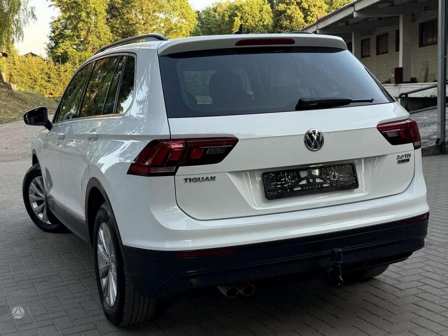 White Volkswagen Tiguan 2016 in Prienai, with an engine capacity of 1.97 L and mileage of 165 thousand km for 14950 €, photo 17 on AUTOMOTO.COM.LV
