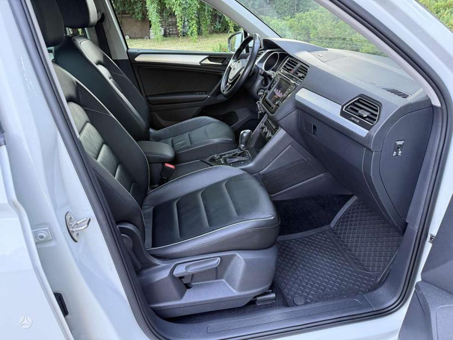 White Volkswagen Tiguan 2016 in Prienai, with an engine capacity of 1.97 L and mileage of 165 thousand km for 14950 €, photo 25 on AUTOMOTO.COM.LV