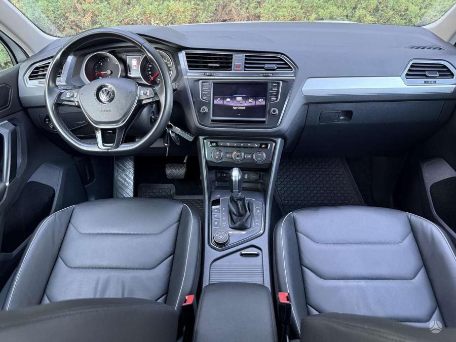 White Volkswagen Tiguan 2016 in Prienai, with an engine capacity of 1.97 L and mileage of 165 thousand km for 14950 €, photo 28 on AUTOMOTO.COM.LV