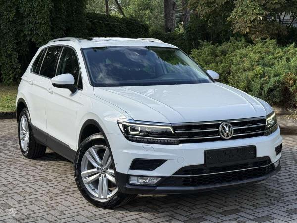White Volkswagen Tiguan 2016 in Prienai, with an engine capacity of 1.97 L and mileage of 229 thousand km for 14950 €, photo 1 on AUTOMOTO.COM.LV
