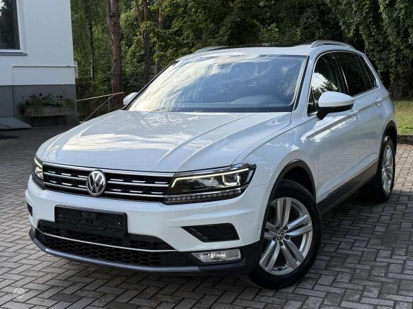 White Volkswagen Tiguan 2016 in Prienai, with an engine capacity of 1.97 L and mileage of 229 thousand km for 14950 €, photo 4 on AUTOMOTO.COM.LV
