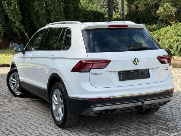 White Volkswagen Tiguan 2016 in Prienai, with an engine capacity of 1.97 L and mileage of 229 thousand km for 14950 €, photo 10 on AUTOMOTO.COM.LV