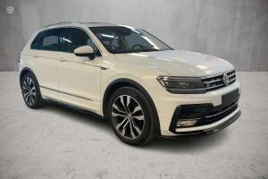 White Volkswagen Tiguan 2016 in Vilnius, with an engine capacity of 1.97 L and mileage of 223 thousand km for 17000 €, photo  on AUTOMOTO.COM.LV