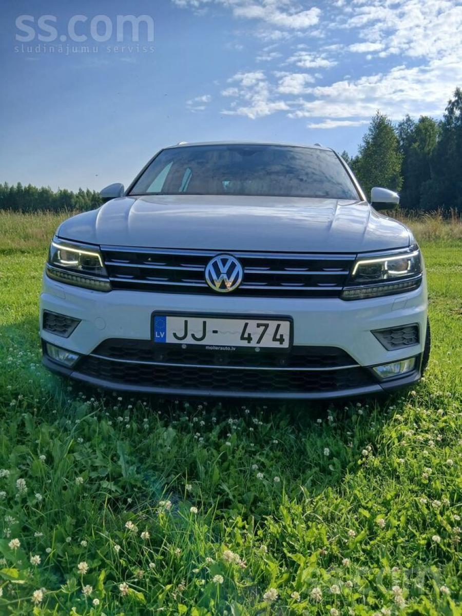 White Volkswagen Tiguan 2016 in Saldus, with an engine capacity of 2.00 L and mileage of 233 thousand km for 13700 €, photo 3 on AUTOMOTO.COM.LV
