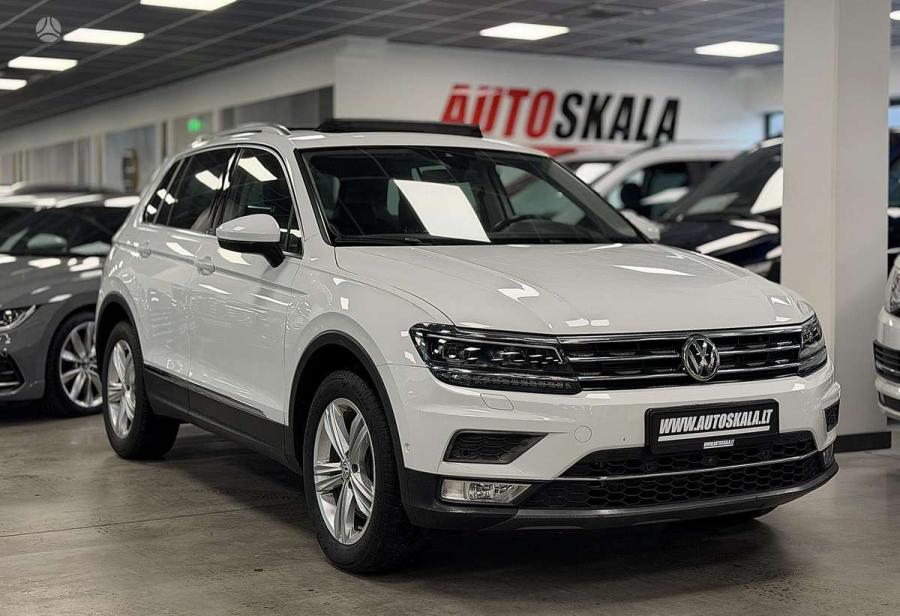 White Volkswagen Tiguan 2016 in Klaipeda, with an engine capacity of 1.98 L and mileage of 279 thousand km for 14950 €, photo 4 on AUTOMOTO.COM.LV