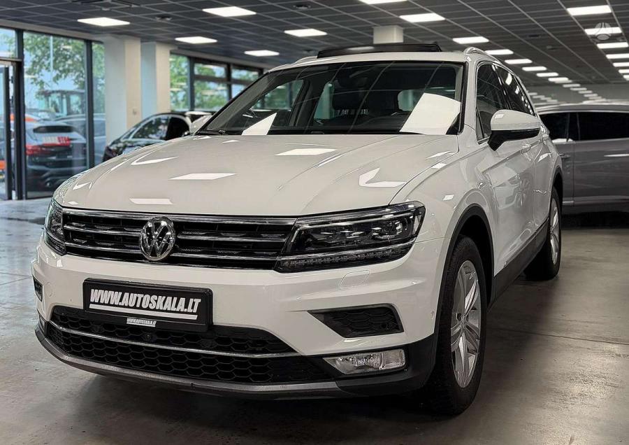 White Volkswagen Tiguan 2016 in Klaipeda, with an engine capacity of 1.98 L and mileage of 279 thousand km for 14950 €, photo 12 on AUTOMOTO.COM.LV