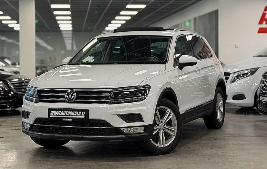 White Volkswagen Tiguan 2016 in Klaipeda, with an engine capacity of 1.98 L and mileage of 279 thousand km for 14950 €, photo 13 on AUTOMOTO.COM.LV