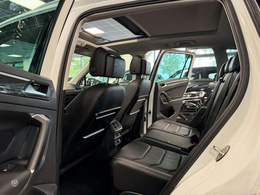 White Volkswagen Tiguan 2016 in Klaipeda, with an engine capacity of 1.98 L and mileage of 279 thousand km for 14950 €, photo 29 on AUTOMOTO.COM.LV