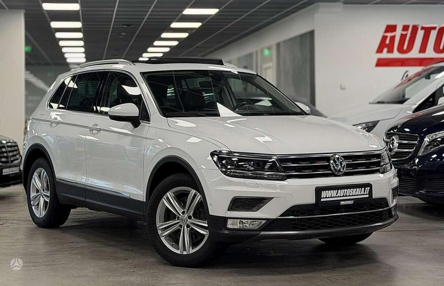 White Volkswagen Tiguan 2016 in Klaipeda, with an engine capacity of 1.98 L and mileage of 279 thousand km for 14950 €, photo 32 on AUTOMOTO.COM.LV