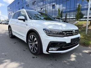 White Volkswagen Tiguan 2016 in Panevezys, with an engine capacity of 1.97 L and mileage of 250 thousand km for 15999 €, photo  on AUTOMOTO.COM.LV