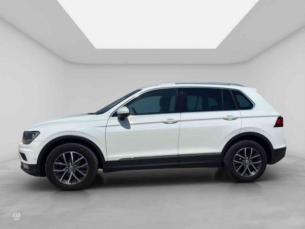 White Volkswagen Tiguan 2016 in Kaunas, with an engine capacity of 2.00 L and mileage of 235 thousand km for 15790 €, photo 3 on AUTOMOTO.COM.LV