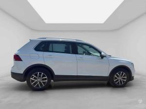 White Volkswagen Tiguan 2016 in Kaunas, with an engine capacity of 2.00 L and mileage of 235 thousand km for 15790 €, photo 8 on AUTOMOTO.COM.LV