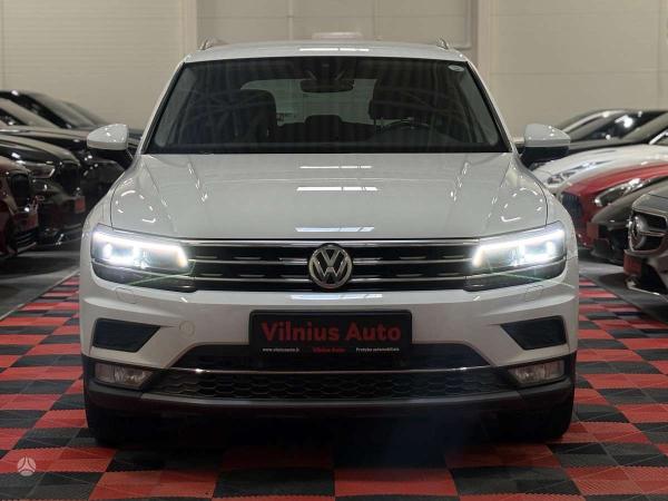 White Volkswagen Tiguan 2016 in Vilnius, with an engine capacity of 1.97 L and mileage of 290 thousand km for 17990 €, photo 2 on AUTOMOTO.COM.LV