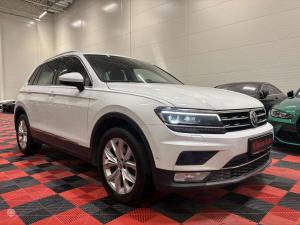 White Volkswagen Tiguan 2016 in Vilnius, with an engine capacity of 1.97 L and mileage of 290 thousand km for 17990 €, photo 4 on AUTOMOTO.COM.LV