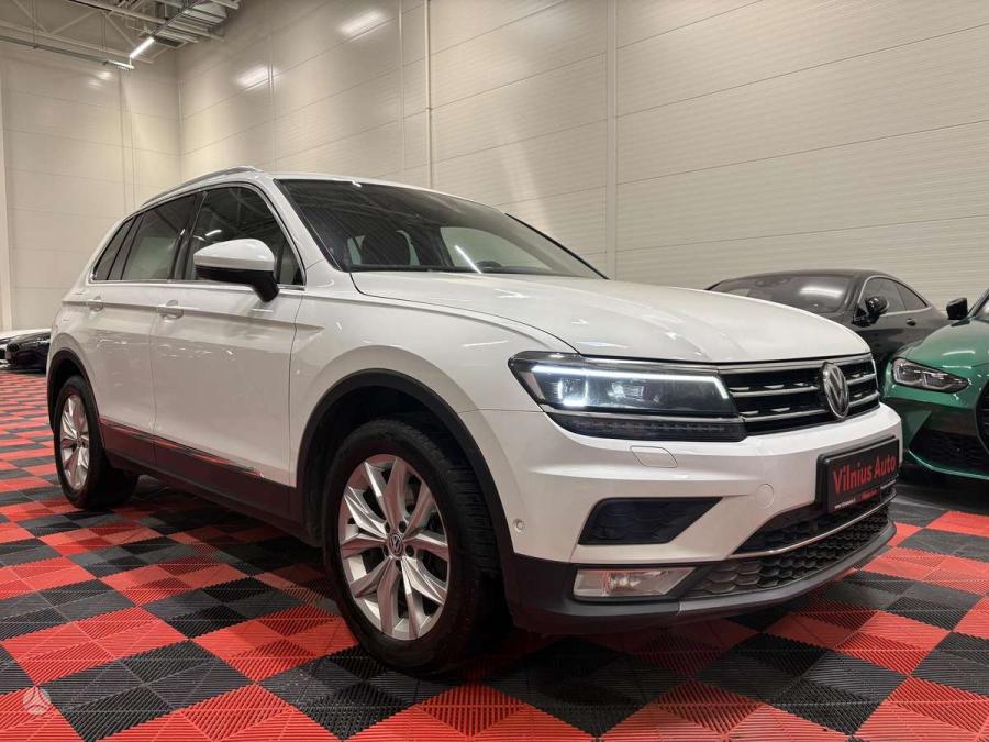 White Volkswagen Tiguan 2016 in Vilnius, with an engine capacity of 1.97 L and mileage of 290 thousand km for 17990 €, photo 4 on AUTOMOTO.COM.LV