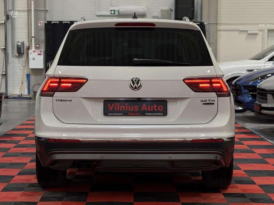White Volkswagen Tiguan 2016 in Vilnius, with an engine capacity of 1.97 L and mileage of 290 thousand km for 17990 €, photo 6 on AUTOMOTO.COM.LV