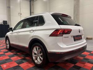 White Volkswagen Tiguan 2016 in Vilnius, with an engine capacity of 1.97 L and mileage of 290 thousand km for 17990 €, photo 7 on AUTOMOTO.COM.LV