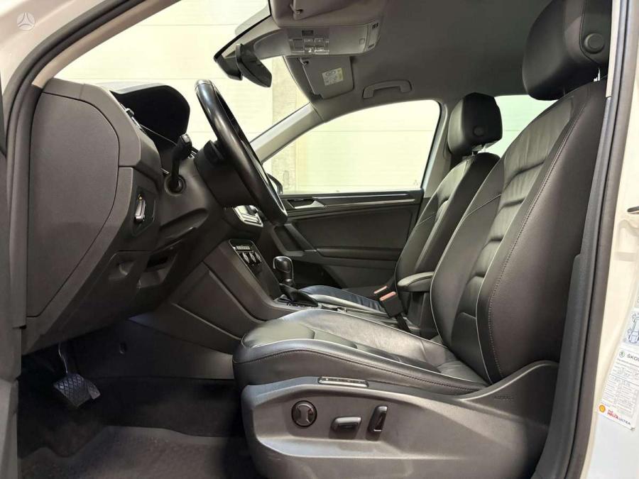 White Volkswagen Tiguan 2016 in Vilnius, with an engine capacity of 1.97 L and mileage of 290 thousand km for 17990 €, photo 14 on AUTOMOTO.COM.LV
