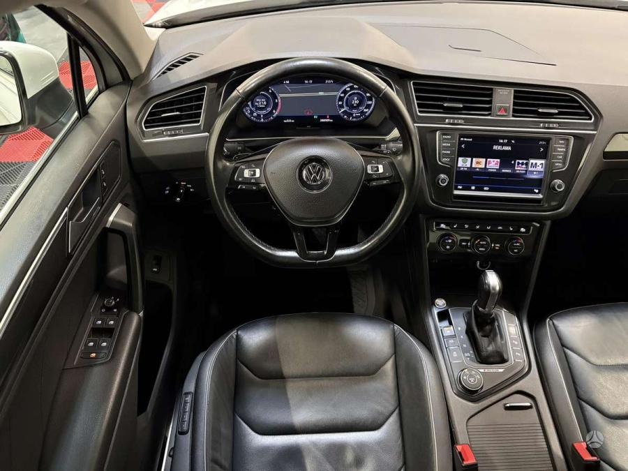 White Volkswagen Tiguan 2016 in Vilnius, with an engine capacity of 1.97 L and mileage of 290 thousand km for 17990 €, photo 20 on AUTOMOTO.COM.LV