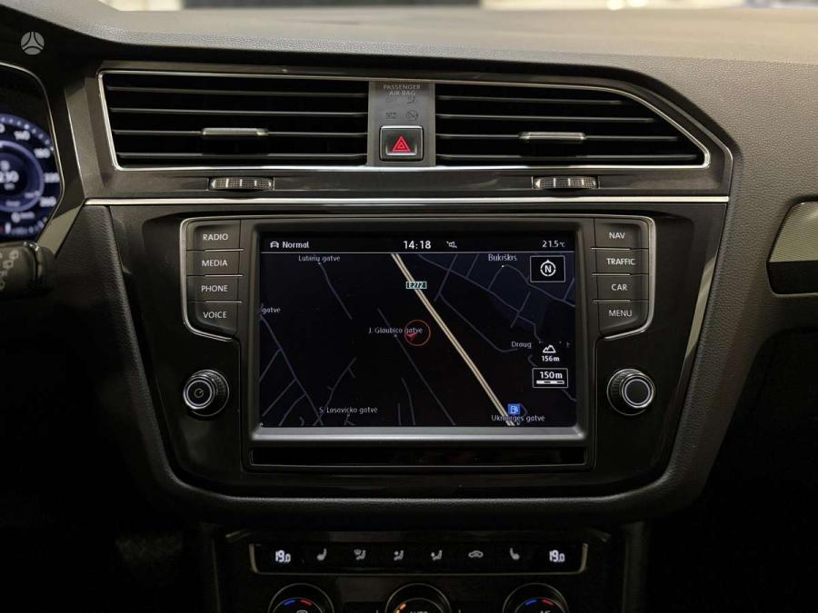White Volkswagen Tiguan 2016 in Vilnius, with an engine capacity of 1.97 L and mileage of 290 thousand km for 17990 €, photo 25 on AUTOMOTO.COM.LV