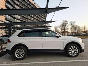 White Volkswagen Tiguan 2016 in Vilnius, with an engine capacity of 1.40 L and mileage of 195 thousand km for 13650 €, photo  on AUTOMOTO.COM.LV