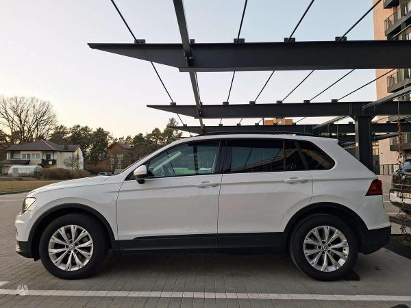 White Volkswagen Tiguan 2016 in Vilnius, with an engine capacity of 1.40 L and mileage of 195 thousand km for 13650 €, photo 5 on AUTOMOTO.COM.LV
