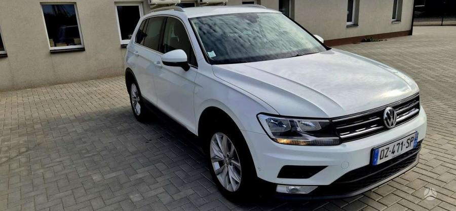 White Volkswagen Tiguan 2016 in Taurage, with an engine capacity of 1.97 L and mileage of 257 thousand km for 11100 €, photo 4 on AUTOMOTO.COM.LV