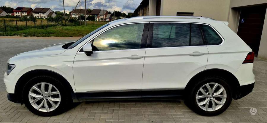 White Volkswagen Tiguan 2016 in Taurage, with an engine capacity of 1.97 L and mileage of 257 thousand km for 11100 €, photo 11 on AUTOMOTO.COM.LV