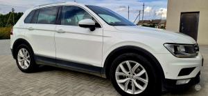 White Volkswagen Tiguan 2016 in Taurage, with an engine capacity of 1.97 L and mileage of 257 thousand km for 11100 €, photo 12 on AUTOMOTO.COM.LV