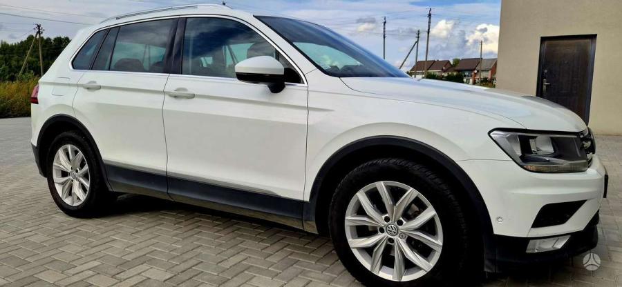 White Volkswagen Tiguan 2016 in Taurage, with an engine capacity of 1.97 L and mileage of 257 thousand km for 11100 €, photo 12 on AUTOMOTO.COM.LV