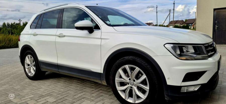 White Volkswagen Tiguan 2016 in Taurage, with an engine capacity of 1.97 L and mileage of 257 thousand km for 11100 €, photo 13 on AUTOMOTO.COM.LV
